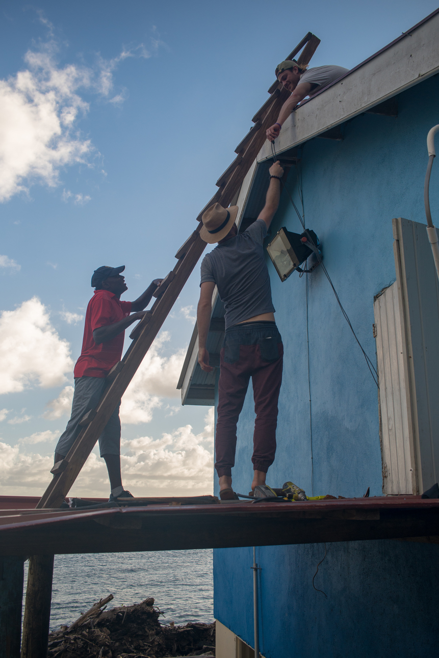 Installing solar panels in Dominica_cred Chris Shashaty_Swarm - YAG